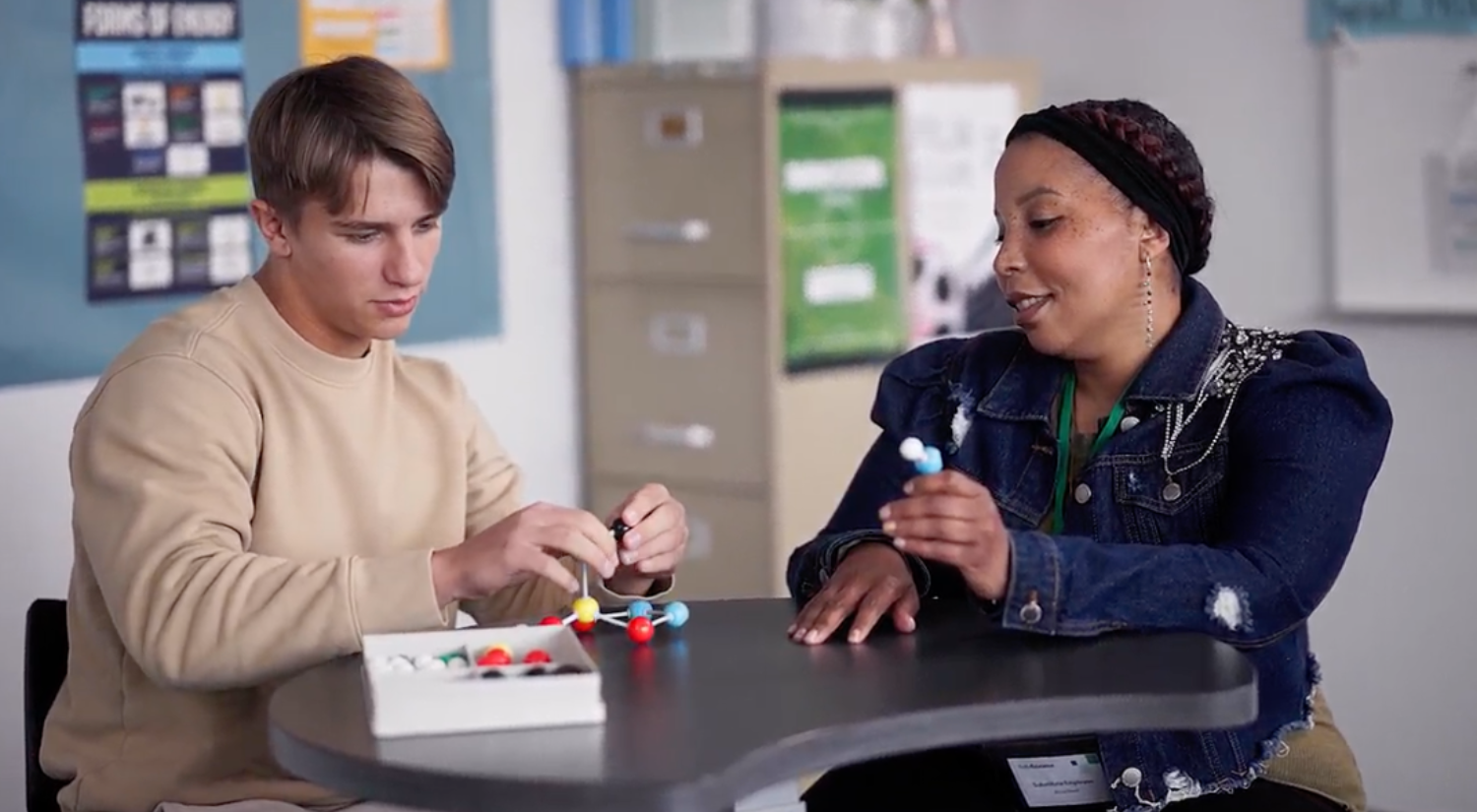 What are the benefits of school-based occupational therapy?